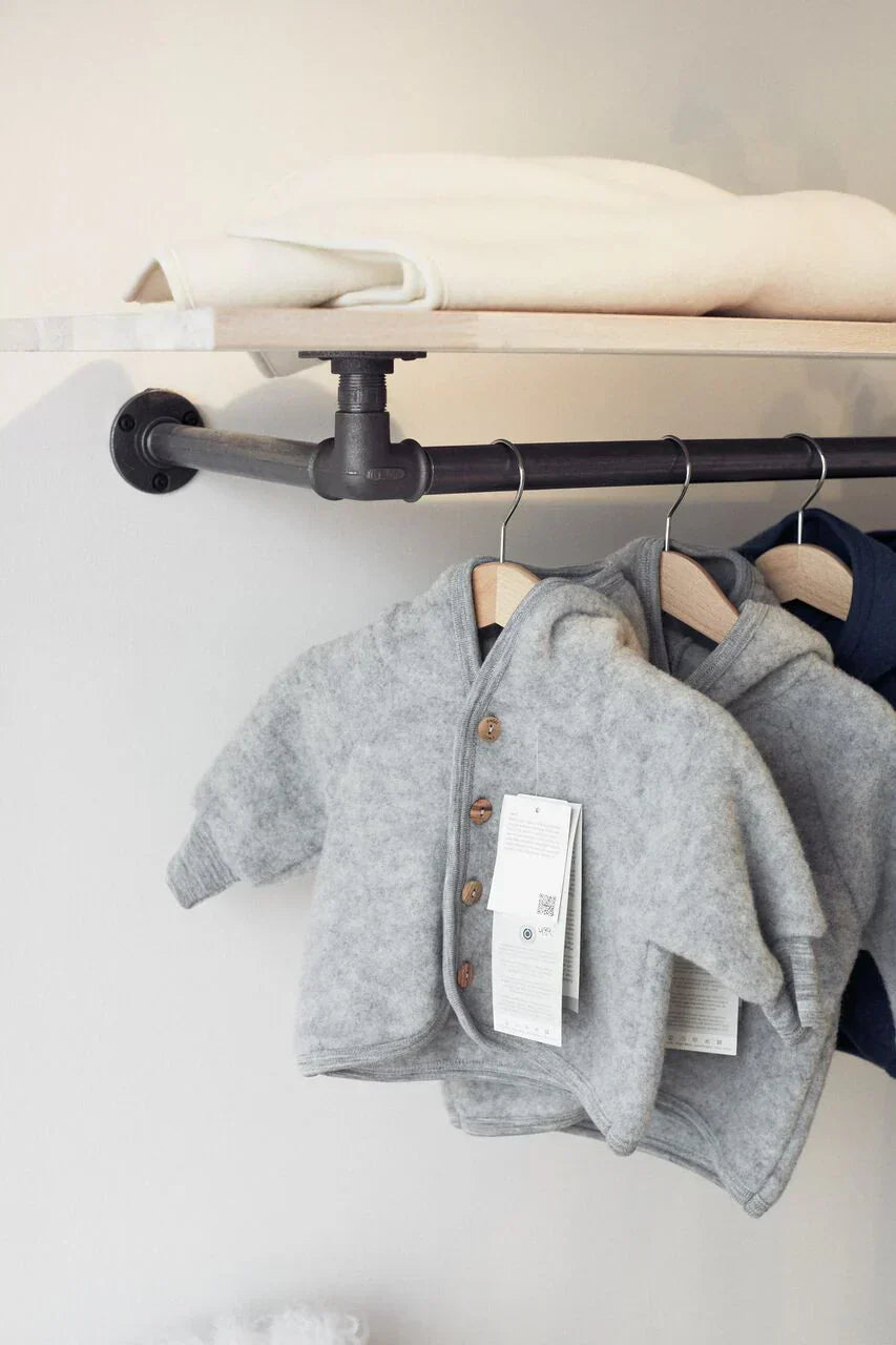 Store interior with clothes racks by RackBuddy - Nordic Wool